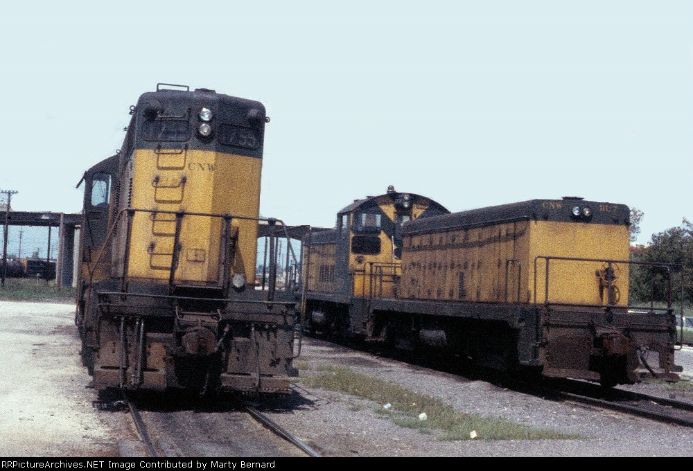 C&NW GP9 1755, Yard Slug BU7, and Probably SW1200 310